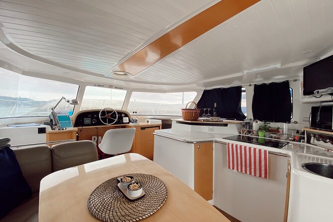 2H Lisbon Private Luxury Catamaran Tour with Welcome Drink - The Sum Up