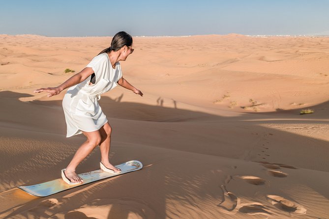 Dubai Desert Discovery: Red Dunes Safari, Sandboard & Camel Ride - What to Expect on the Dubai Desert Discovery Tour