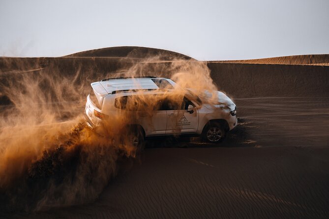 Dubai Evening Desert Safari: Sandboarding, BBQ, Camel Ride & more - An In-Depth Look at the Dubai Desert Safari Experience