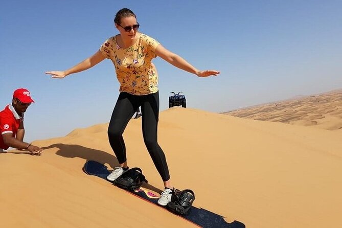 Dubai Self-drive Quad Bike, Sand Boarding, Camels & Refreshments - Thrilling Activities: Quad Biking and Sandboarding