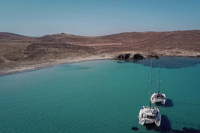 Luxury Catamaran Semi private cruise with meals & drinks and transportation. - Discovering Mykonos by Sea: What to Expect from the Cruise