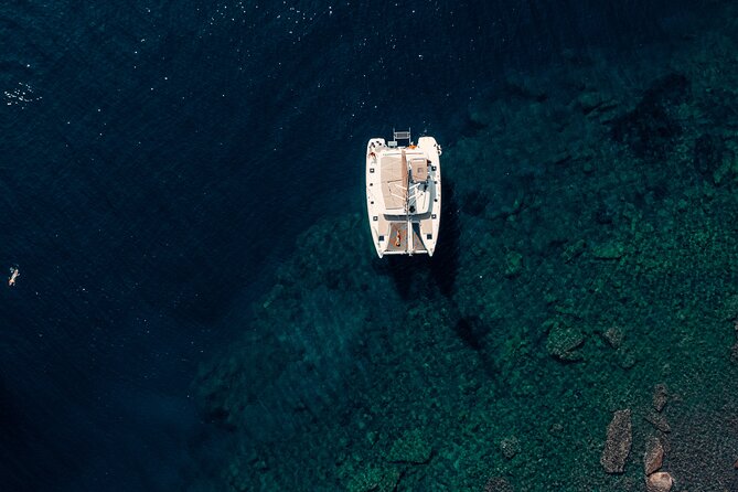 Romantic Sunset Catamaran Caldera Cruise incl. Meal & Drinks - The Experience in Detail