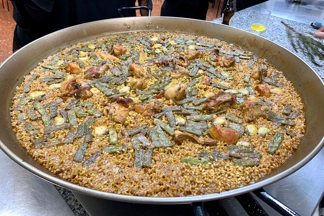 Valencian paella cooking class, tapas and visit to Ruzafa market. - Key Points