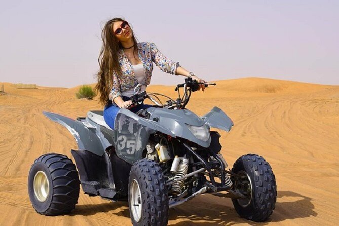 Dubai desert safari with bbq, quad bike and camel ride authentic experiences and traveler insights