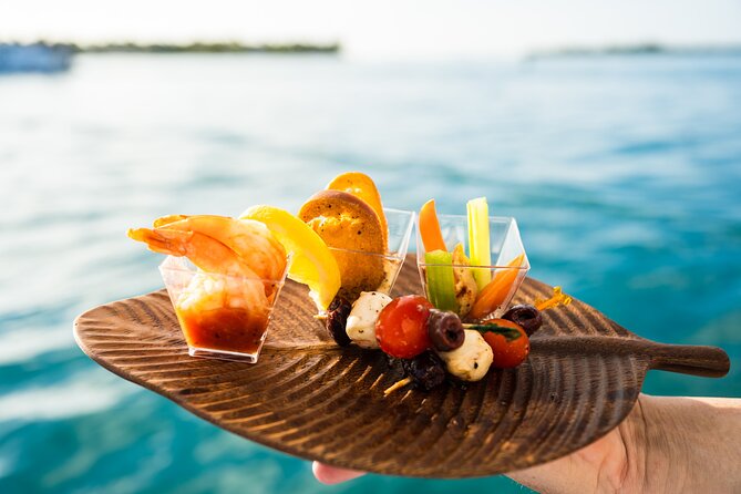 Key west sunset sail with full bar, live music and hors d'oeuvres the sum up