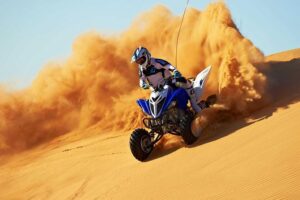 Morning desert safari with quad bike camel rides and additional attractions