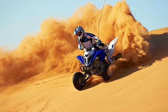 Morning desert safari with quad bike camel rides and additional attractions