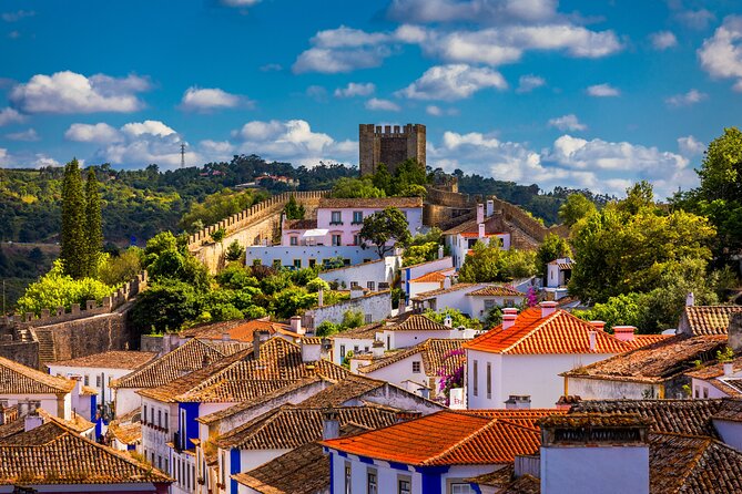 Three cities in one day: porto, nazare and obidos from lisbon price and value