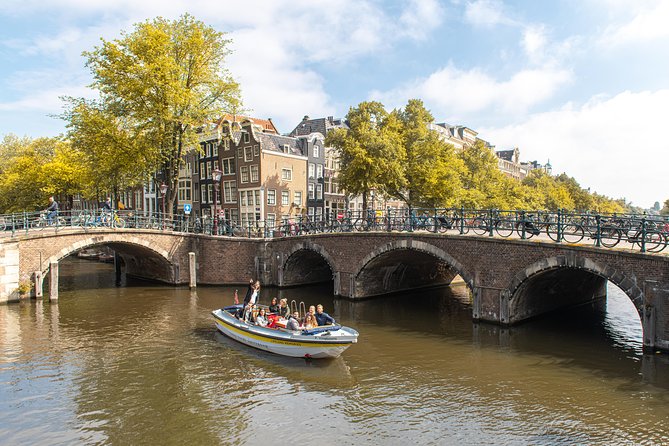 Amsterdam Open Boat Tour with Local Guide - The Real Traveler Experience