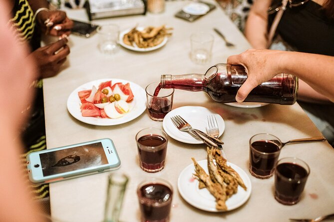 Barcelona Gothic Quarter Tapas & Taverns Food & Wine Tour - Guides, Atmosphere, and Group Size