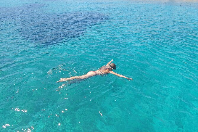 Full-Day Cruise in Antiparos and Despotiko with Barbecue - Despotiko: BBQ and Beach Relaxation