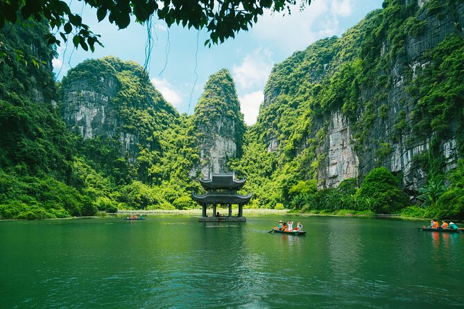 Ninh Binh Day Trip: Hoa Lu-Trang An/Tam Coc-Mua Cave-Cycling-Boat - The Scenic Highlight: Trang An Grottoes Boat Tour