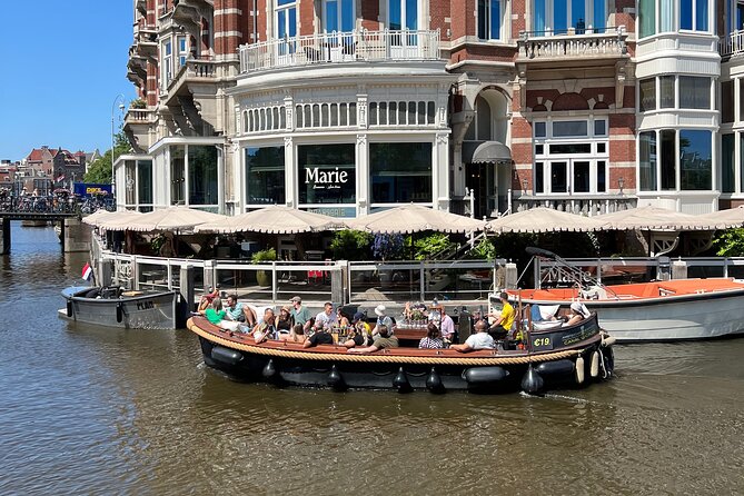 Amsterdam Luxury Boutique Boat tour with Unlimited Beer and Wine - The Sum Up