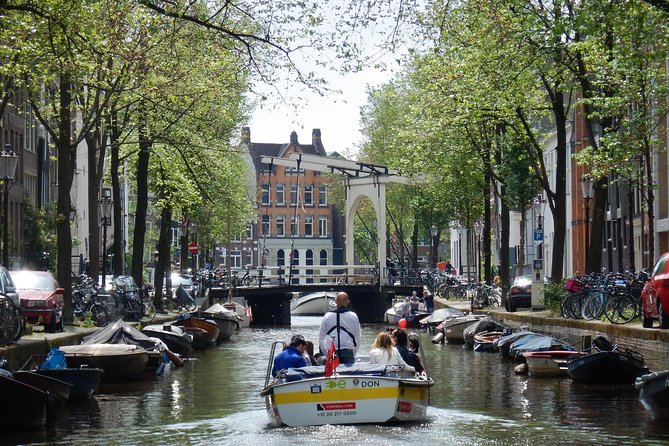 Amsterdam Open Boat Tour with Local Guide - Who Will Love This Tour?