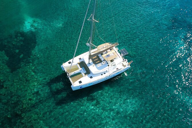 Santorini Classic Catamaran Cruise with BBQ, Drinks and Transfers - The Sum Up