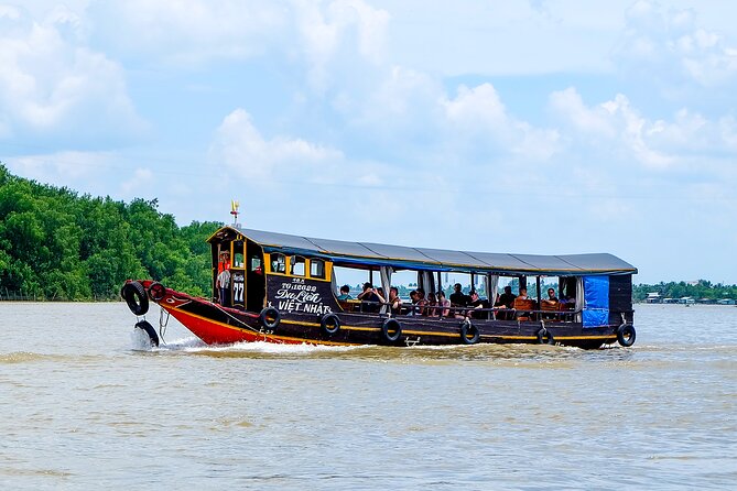 Small-Group Mekong Delta Day Trip: Boat Ride, Cottages & Pagoda - The Garden and Pagoda
