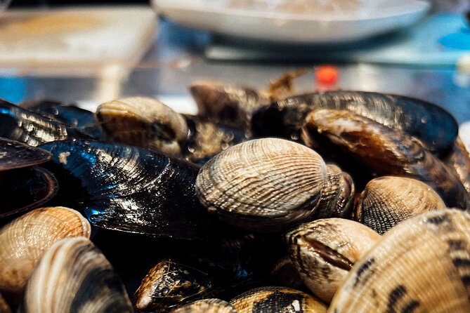 Authentic Barcelona Cooking Class: Market Tour & Paella Workshop - The Sum Up