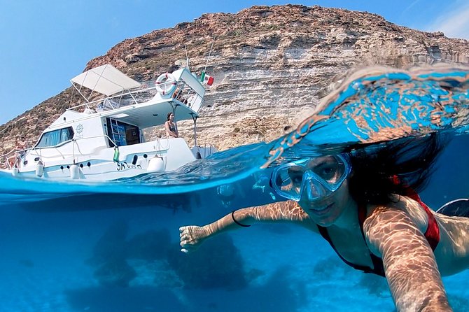 7 hours Boat trip to Lampedusa lunch, SUP and Snorkeling - Exploring the 7-Hour Boat Trip to Lampedusa