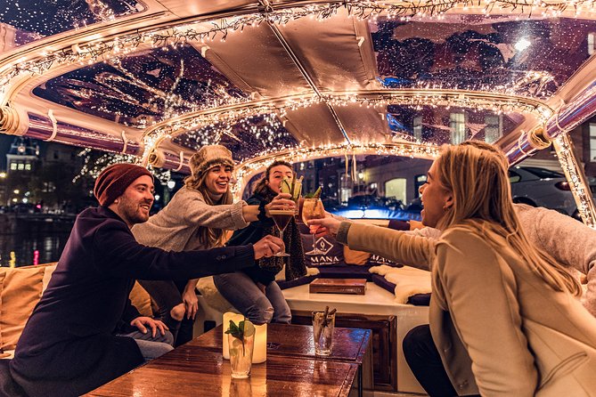 Amsterdam 2-Hour Evening Cruise With Live Guide and Bar - Exploring Amsterdam by Night: What to Expect