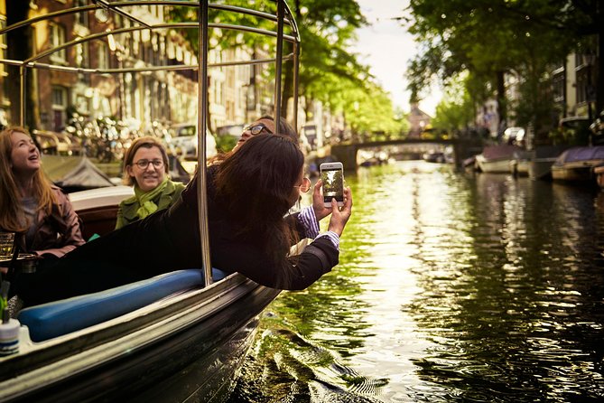 Amsterdam 90-min Private Canal Cruise with Live Guide and Drinks - Introduction: An Authentic Look at a Popular Canal Experience