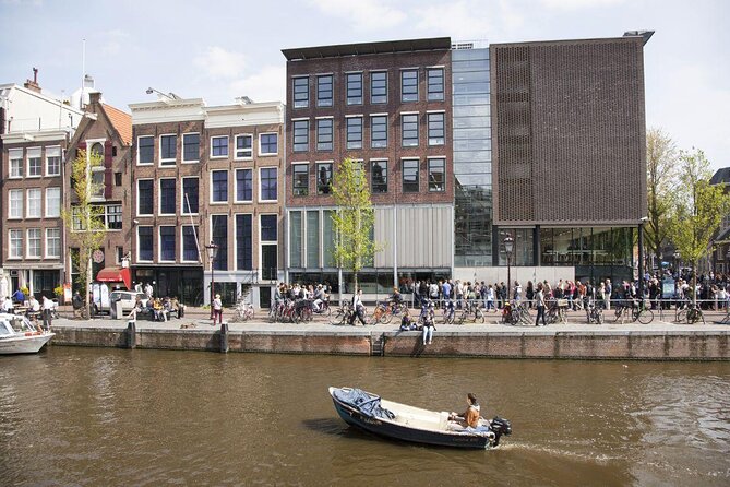 Amsterdam Canal Cruise in Open Boat with Unlimited Drinks Option - Key Points