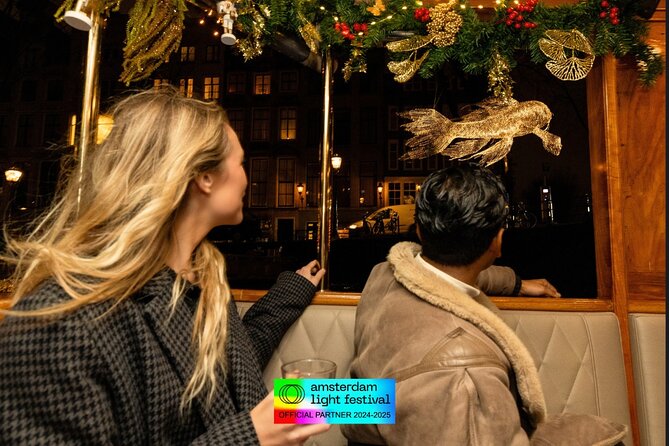 Amsterdam Light Festival: Canal Cruise Covered Saloon Boat - Key Points