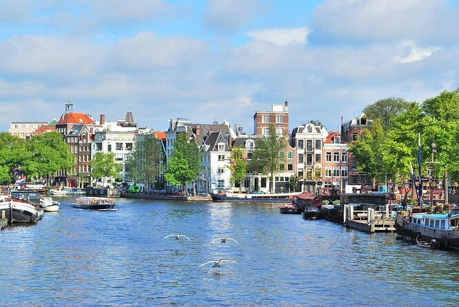 Amsterdam Open Boat Tour with Local Guide - Key Points