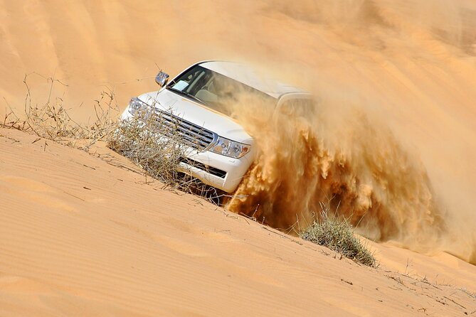 Dubai Evening Desert Safari With Transfers Dune Bashing & Dinner - Key Points