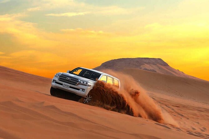 Evening Red Dunes Safari with Quad Biking, BBQ Dinner & LiveShows - Key Points