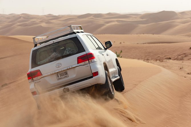 Premium Dubai Desert Safari with BBQ Dinner in the Red Dunes - Key Points