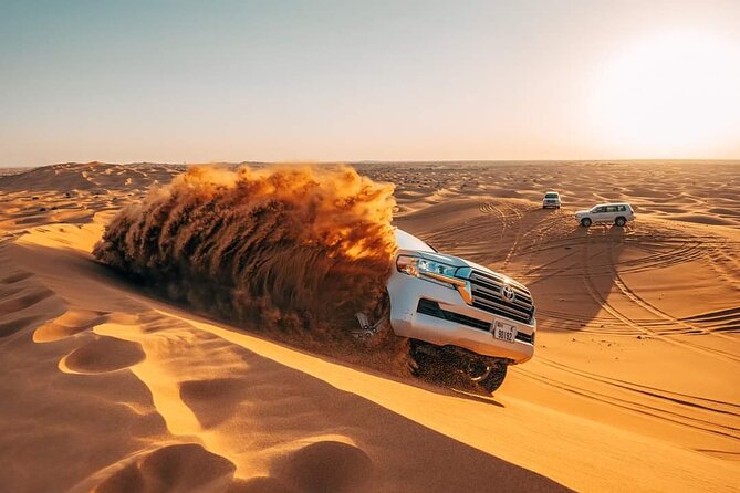 Red Dunes Desert Safari with 4x4 Pick up & Drop, Camel ride, BBQ and Live shows - Key Points