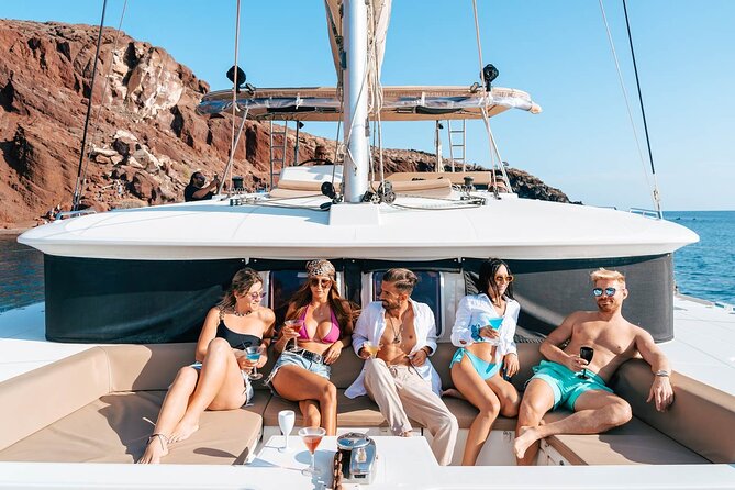 Santorini Catamaran Day Cruise: Lunch, BBQ, Open Bar, Transfers - Key Points