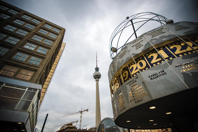 Small Group Walking Tour of East Berlin with a French Guide - Key Points