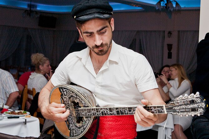 Traditional Greek Night live Music & Dinner Show in Santorini - Key Points