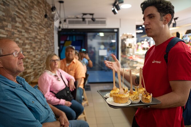 Barcelona: Evening Foodie Adventure with 8 Tapas & 4 Drinks - Key Points