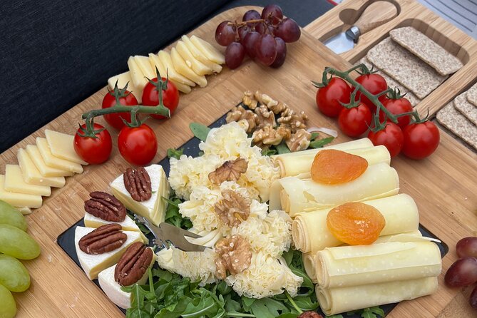 Cheese platter by Boat on Lake Thun, Interlaken - What to Expect from the Experience