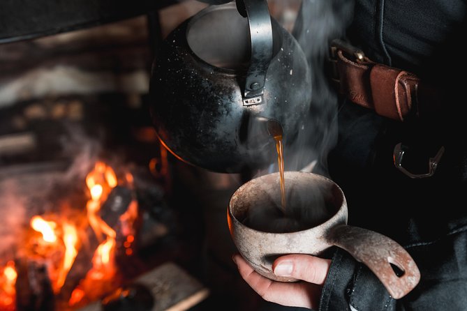 Evening Escape - Snowmobile safari and campfire in Rovaniemi - The Campfire Stop: Authentic Lappish Flavors in the Wilderness