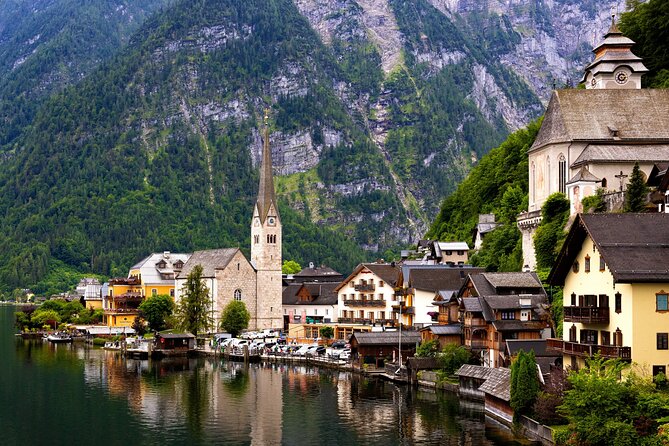 From Vienna: Day Tour to Hallstatt and Salzburg with Boat Ride - Key Points