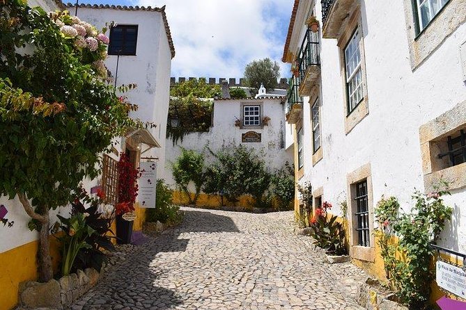 Óbidos, Peniche and Buddha Eden Full Day Private Tour from Lisbon - Key Points