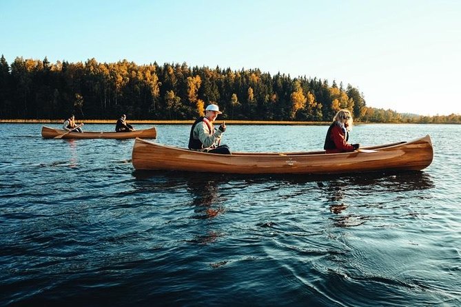 Premium guided Canoe Tour in lake Plateliai Handcrafted inventory and picnic set - Key Points