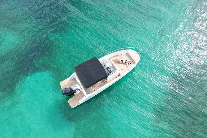 Private Boat Tour of San Antonio with Paddel surfing and Snorkeling - The Itinerary in Detail: What to Expect from Each Stop