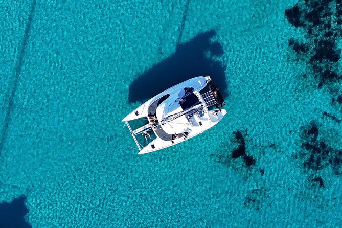 Private Mykonos Catamaran Day Cruise with Meals & Water Toys - Key Points