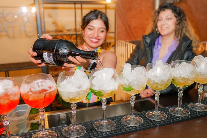 Rome Nightlife Experience: Award-Winning Bar Crawl with Guide - Strolling Down Via dei Fori Imperiali and Beyond