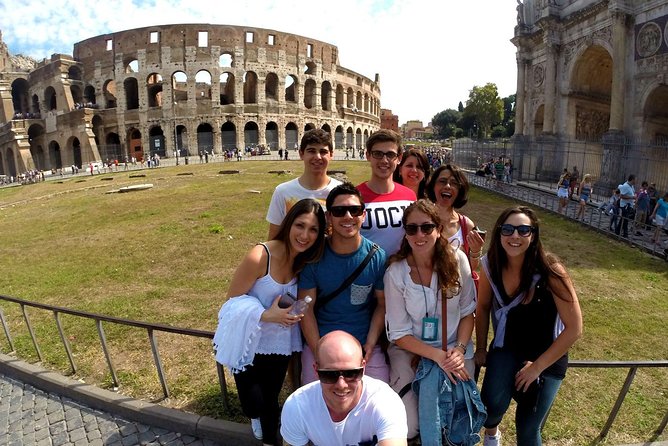 Rome: Vatican Museums and Colosseum Private Tour with Transfers - Exploring the Ancient Roots: The Colosseum and Roman Forum