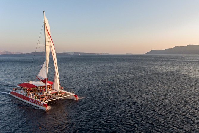 Sailing Catamaran Cruise in Santorini with BBQ, Drinks and Transfer - Setting Sail in Santorini: What to Expect