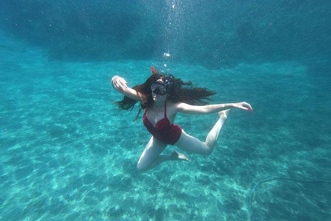 Small-Group Santorini Sea Caves Kayak Trip with Snorkeling & Picnic - Exploring Santorini from the Water