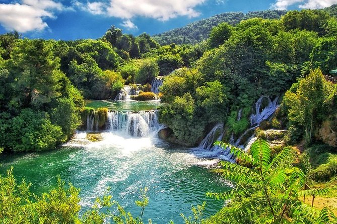 Split: Krka Waterfalls Morning/Afternoon with Boat Cruse, Olive Oil & Wine Taste - The Experience on the Ground