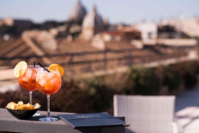 Sunset drinks on the rooftops of Rome - An Authentic Rooftop Getaway Over Rome