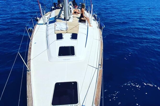 Sunset Tour with Nadia K to Delos and Rhenia Island from Mykonos - The Journey Begins: Pickup and Departure