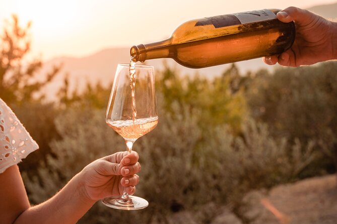 Sunset wine tasting in vineyard - The Hike and Land Connection